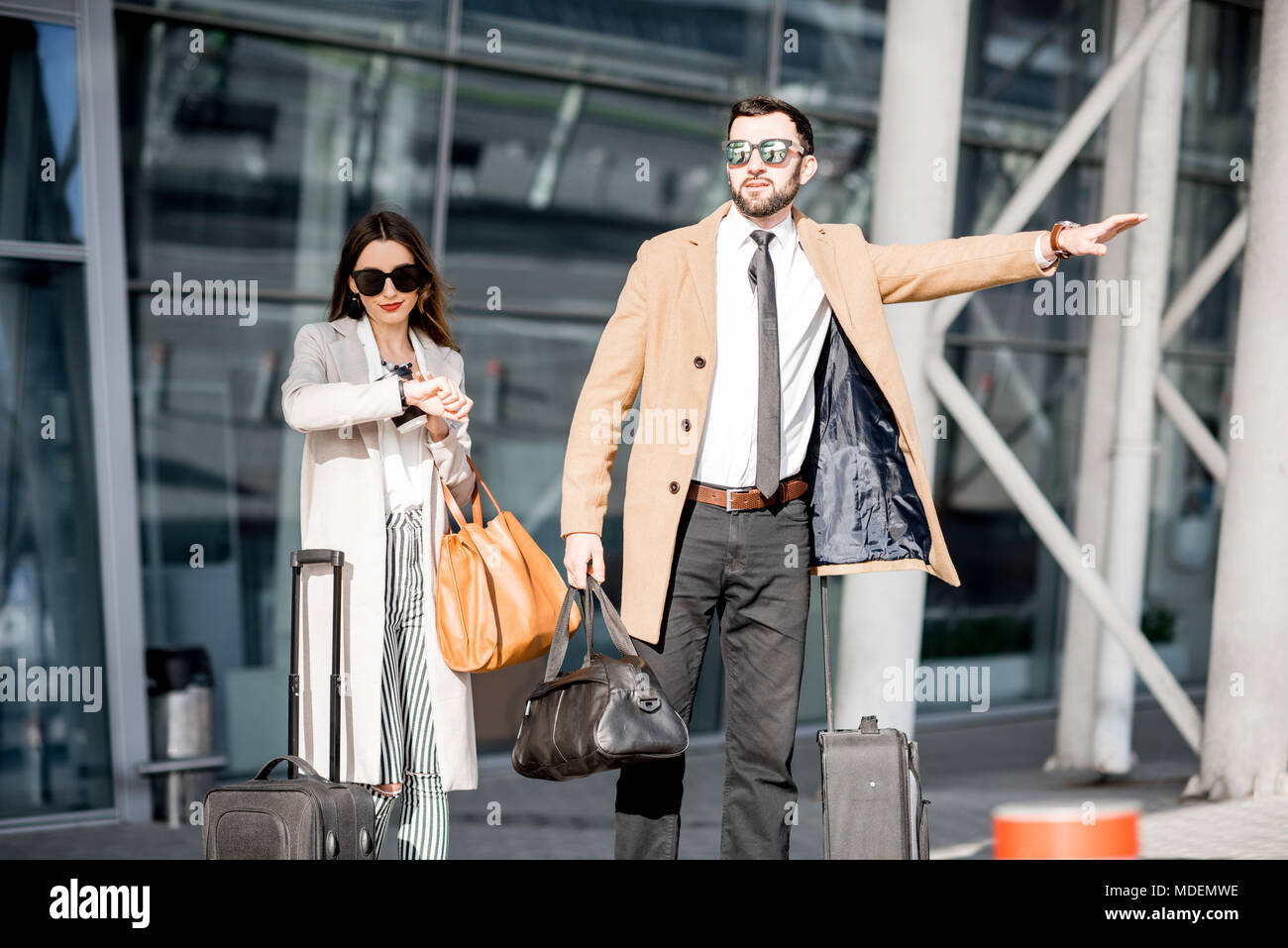 Catching a taxi hi-res stock photography and images - Alamy