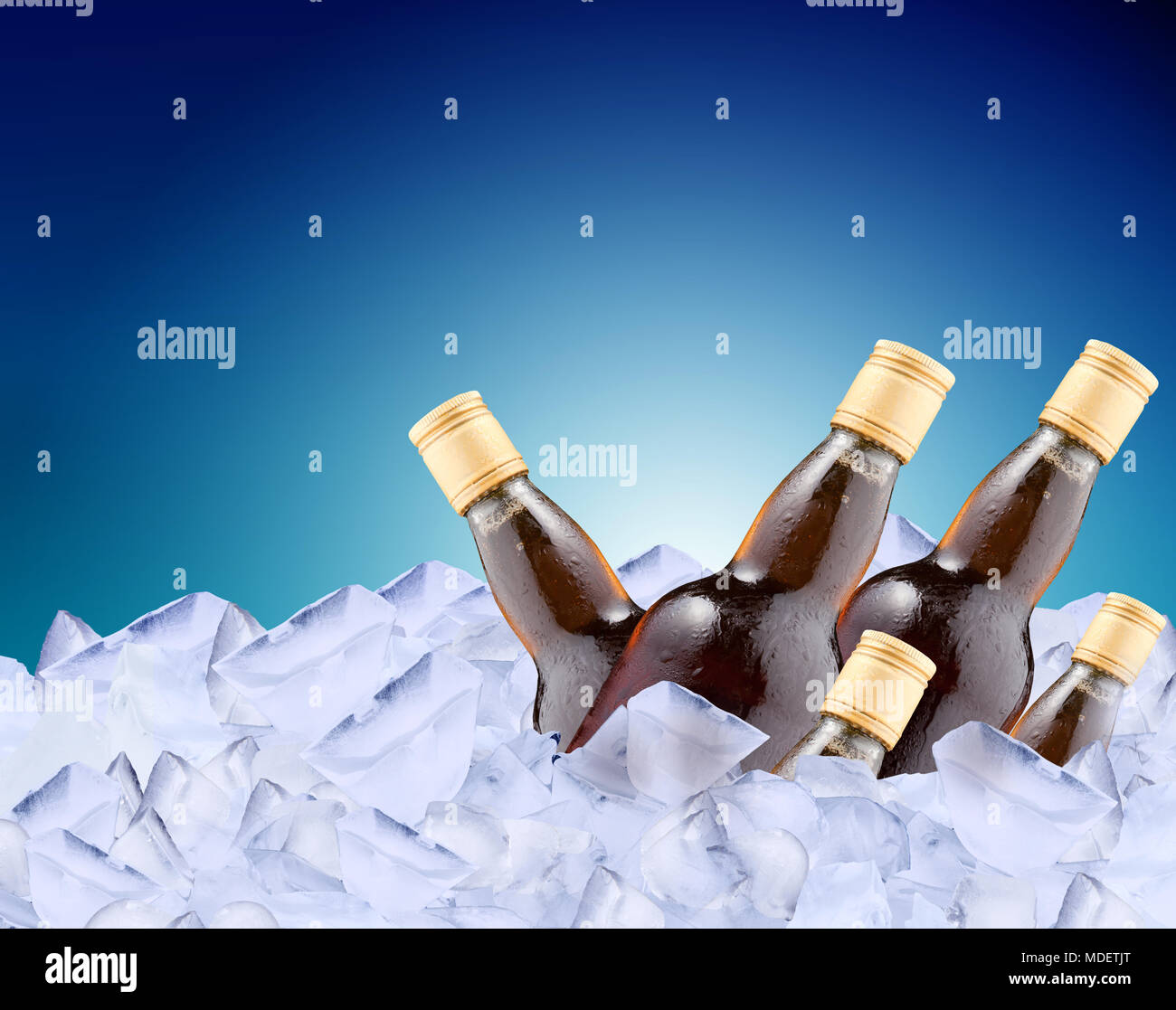 cool drink in ice and blue background Stock Photo - Alamy