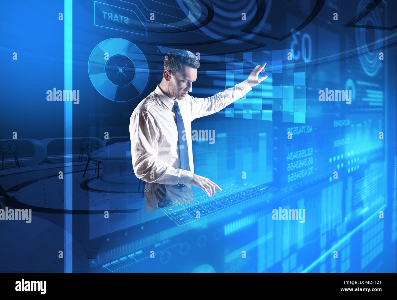 Clever programmer standing in front of a transparent screen Stock Photo ...