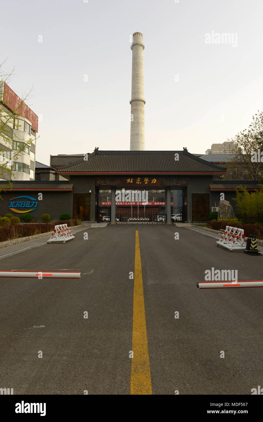 Entrance to a compound with local heating water generation station ...