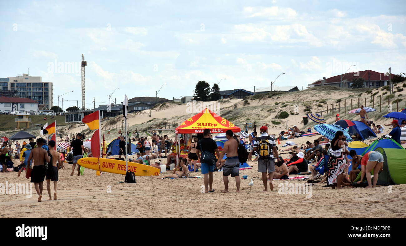 Cronulla, Australia - Jan 7, 2018. People relaxing at the beach on a ...