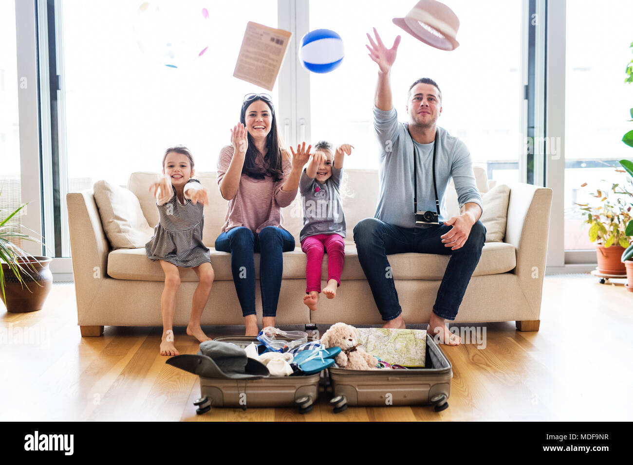 Man woman family children luggage hi-res stock photography and images ...