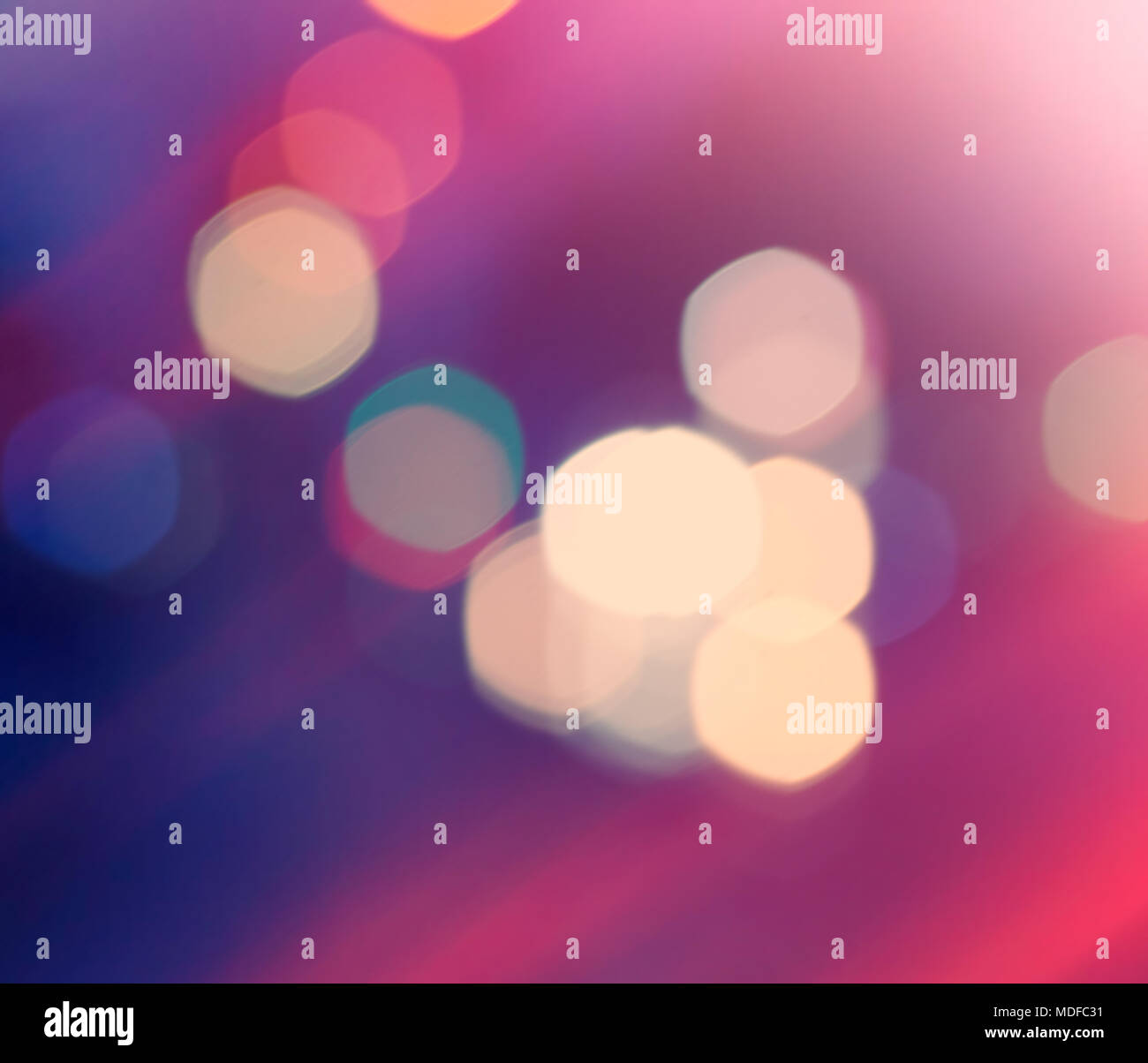 Abstract blurred background. Multicolored light spots on a dark ...