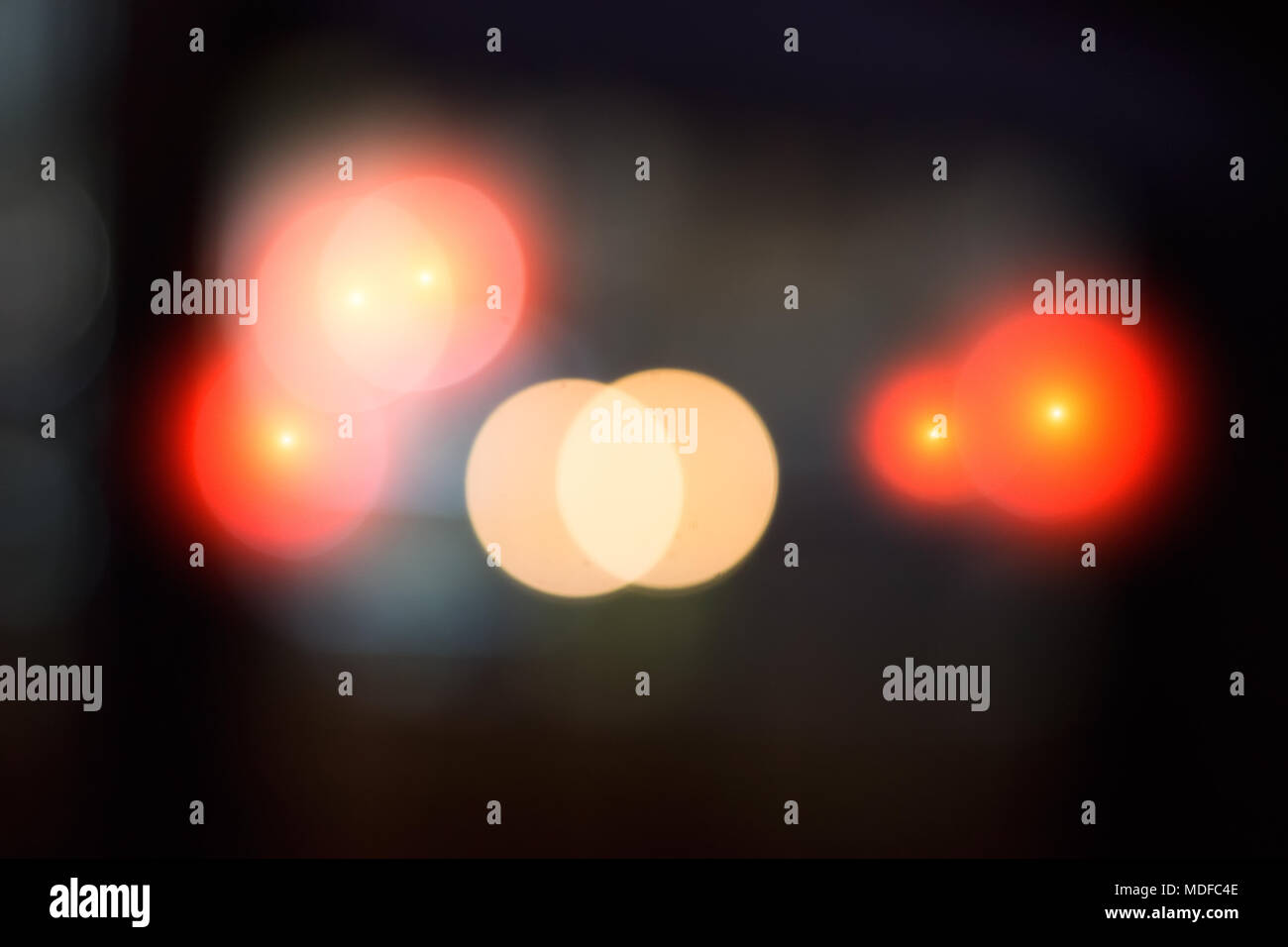Abstract blurred background. Multicolored light spots on a dark ...