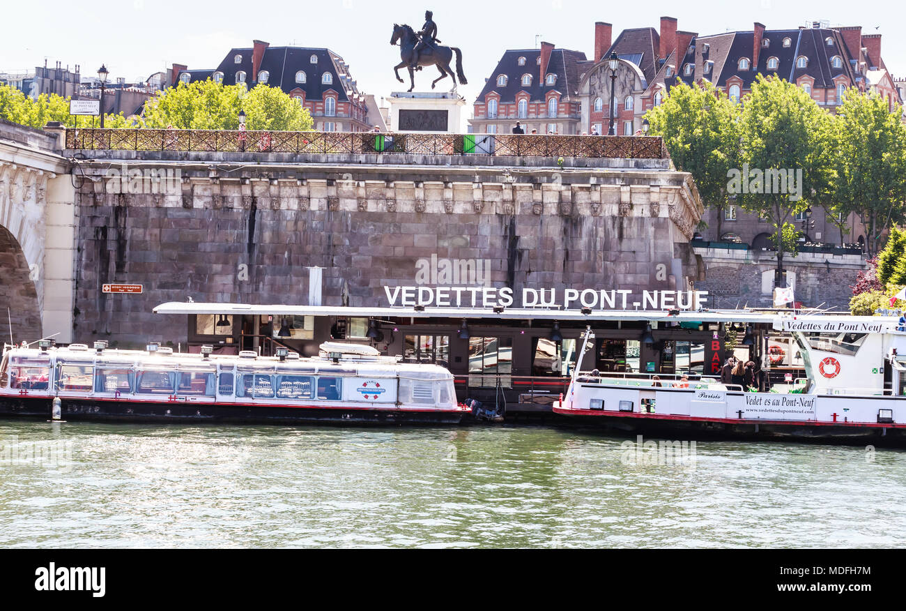 Island of the City. The Vedettes du Pont Neuf tour boat on the Seine ...