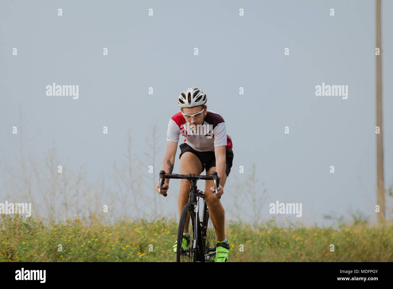 Male on cycle hi-res stock photography and images - Alamy