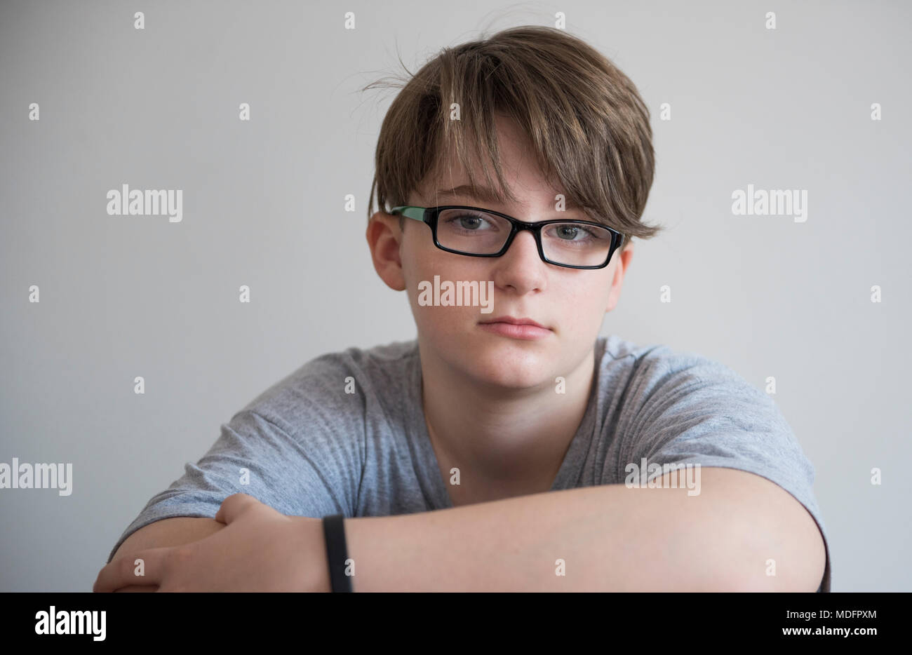 Portrait of a boy wearing spectacles Stock Photo - Alamy