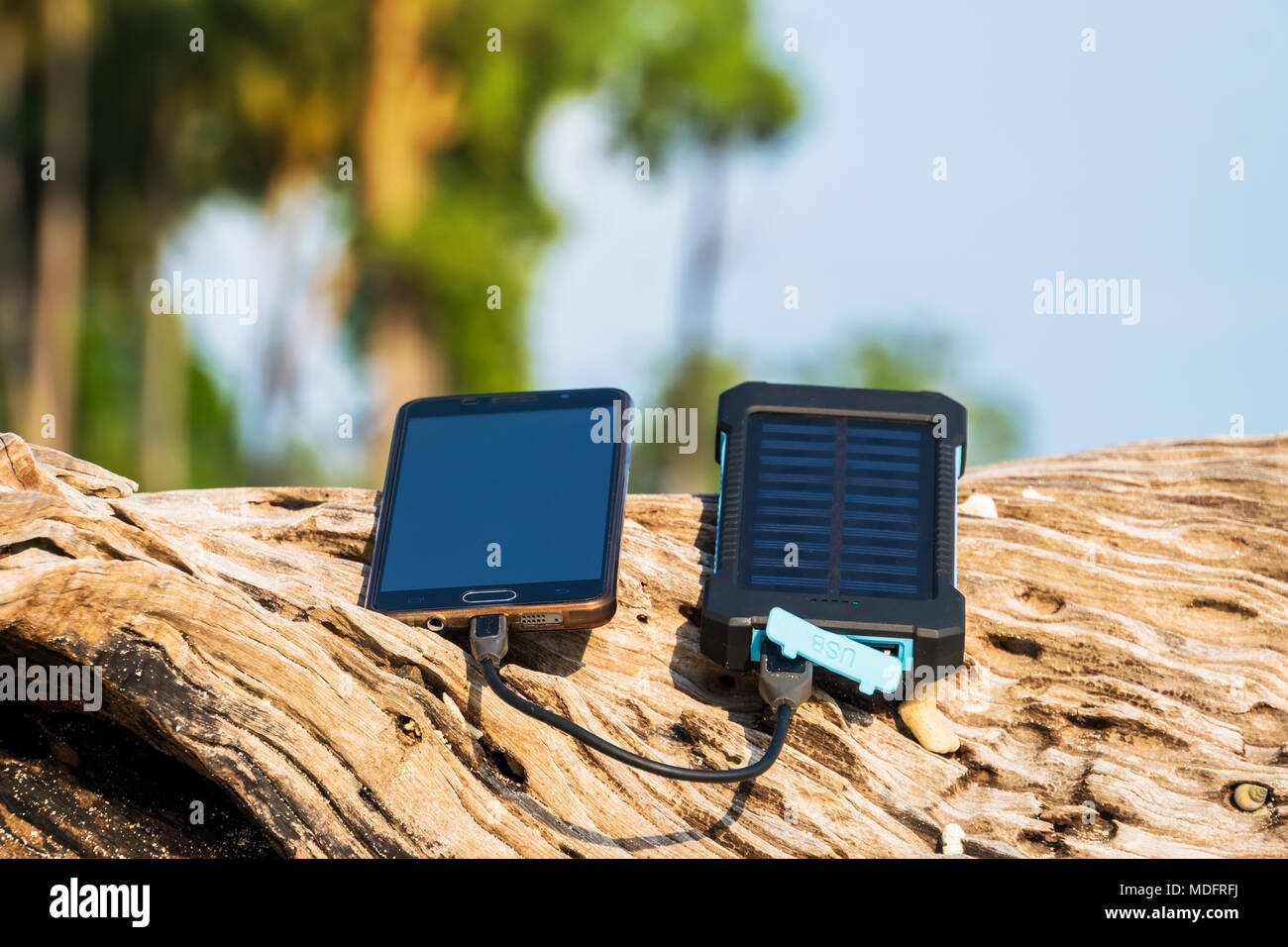 Alternative energy source. battery is charged by solar energy. Charging ...