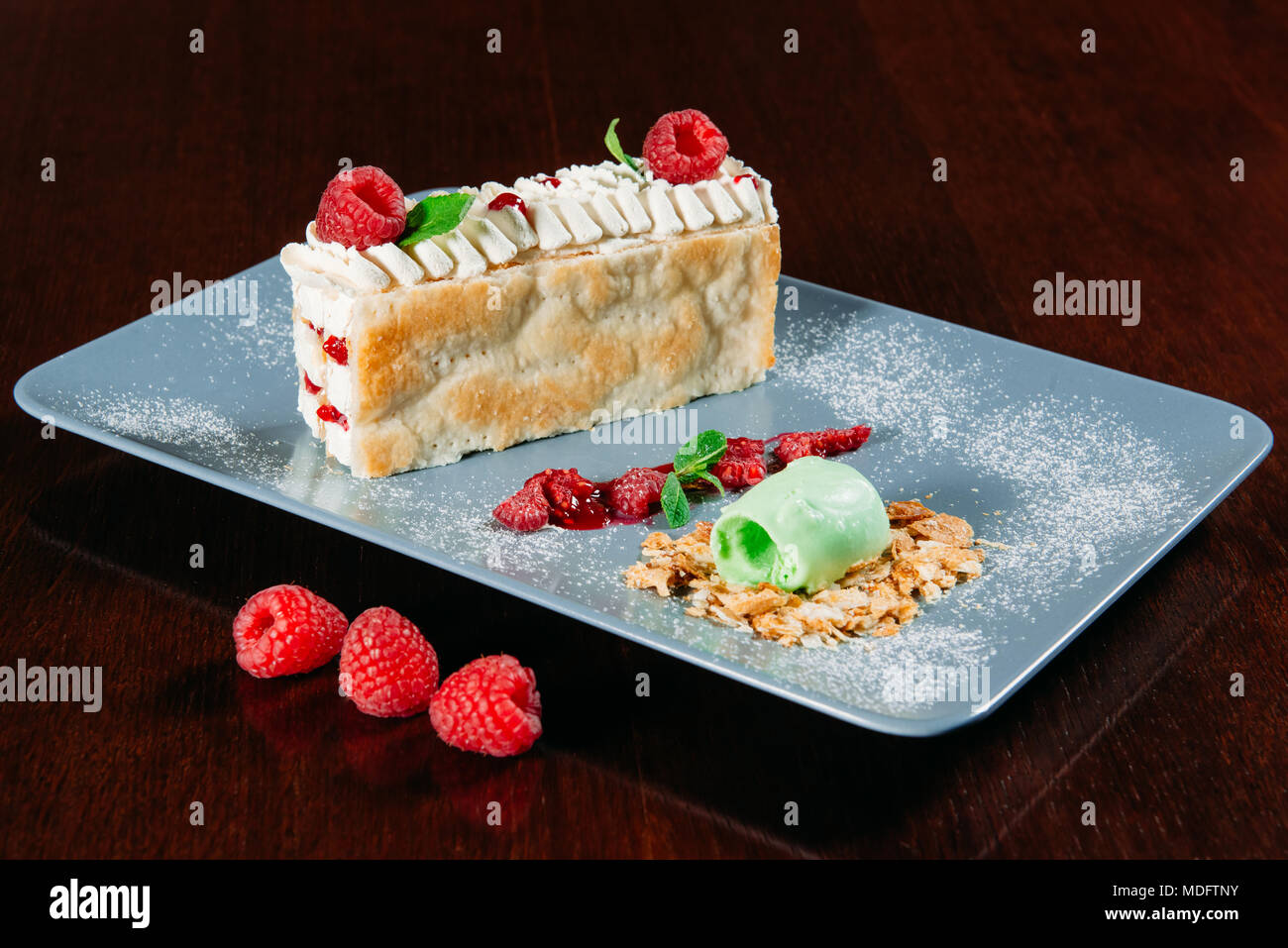 Raspberry pastry dessert with ice-cream Stock Photo - Alamy