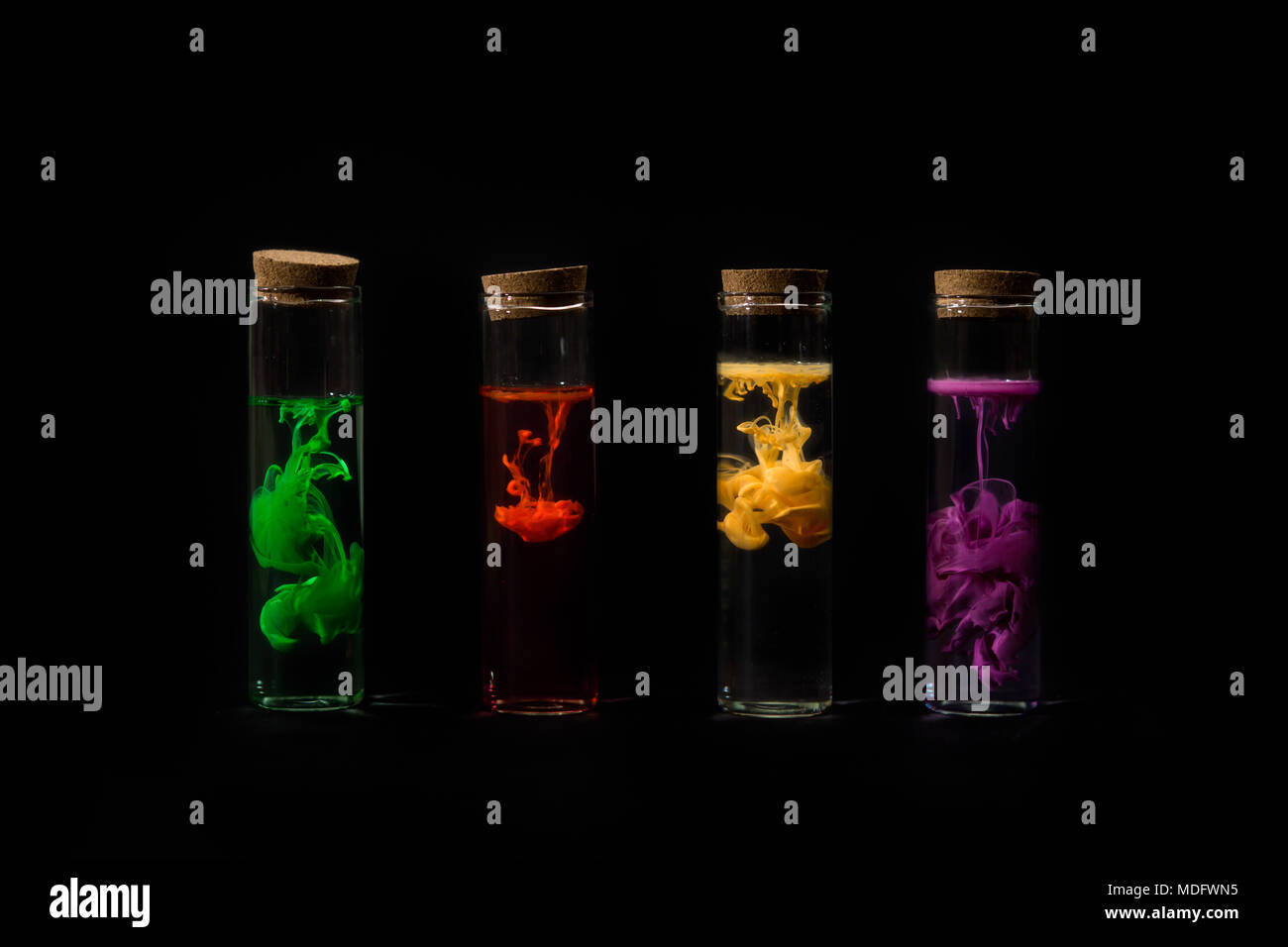 Four test tubes hi-res stock photography and images - Alamy