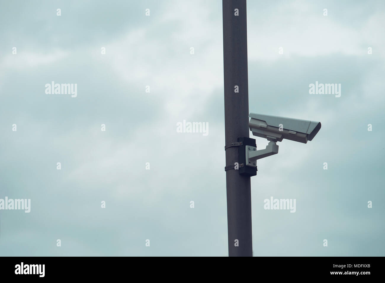Traffic control surveillance camera mounted on the post Stock Photo - Alamy