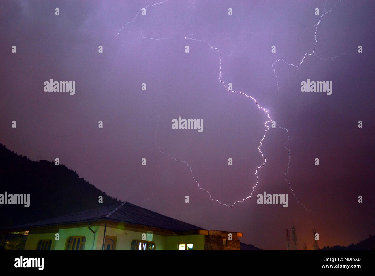Lightning strikes during a thunderstorm in Srinagar, Indian ...