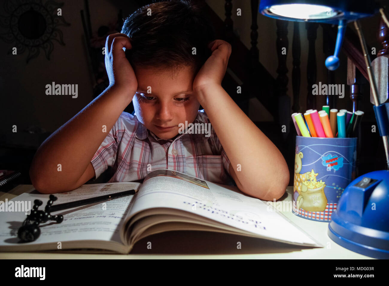 Back to school, student at study desk © ABEL F. ROS/Alamy Stock Stock ...