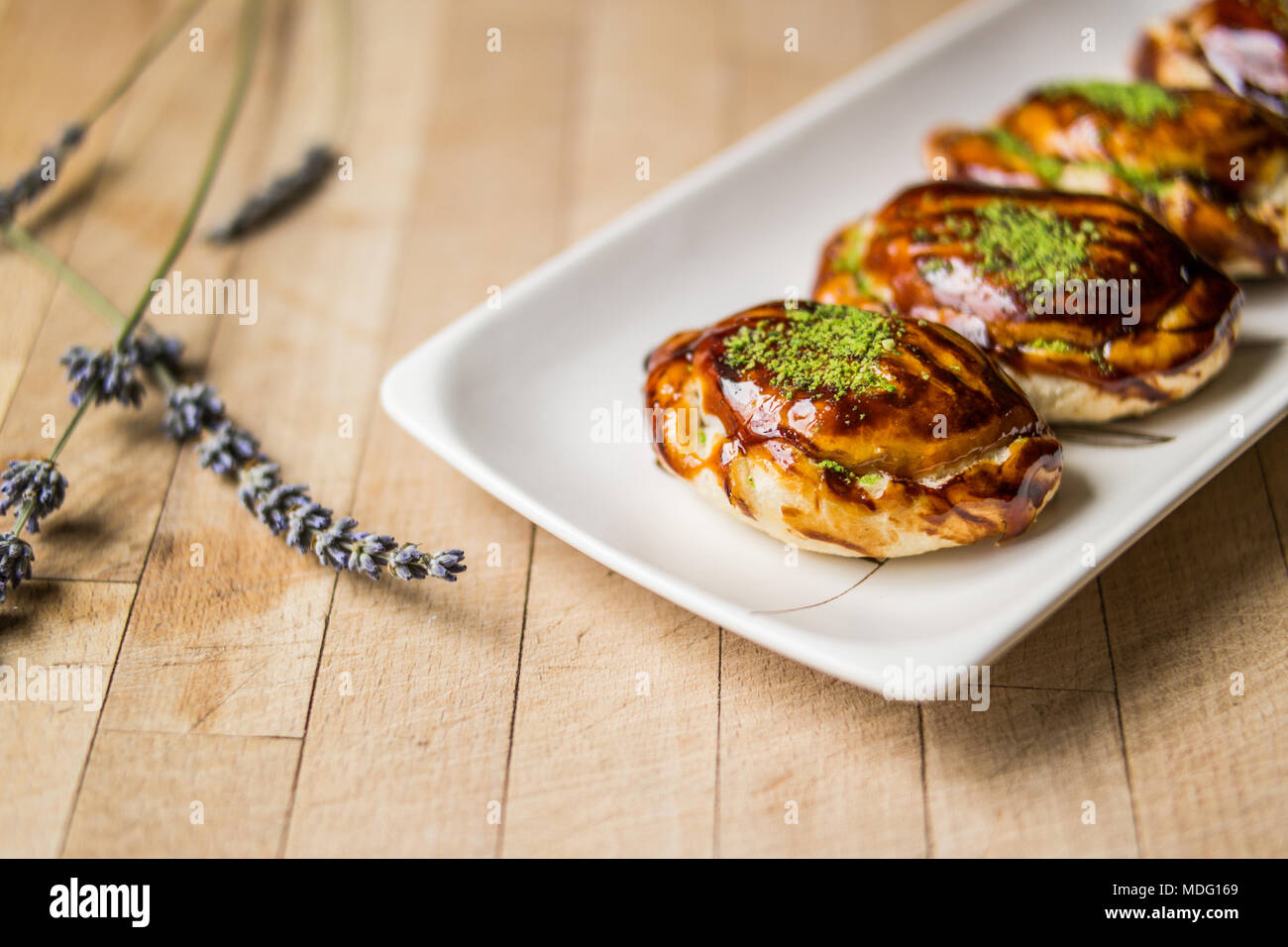 homemade sweet pastries with pistachio powder Stock Photo - Alamy