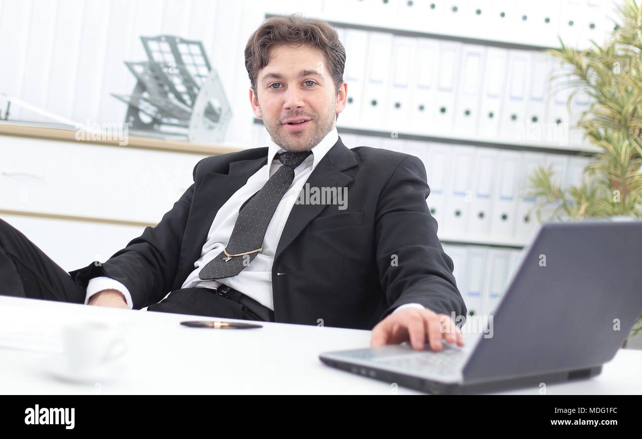 closeup of a senior Manager sitting at Desk Stock Photo - Alamy