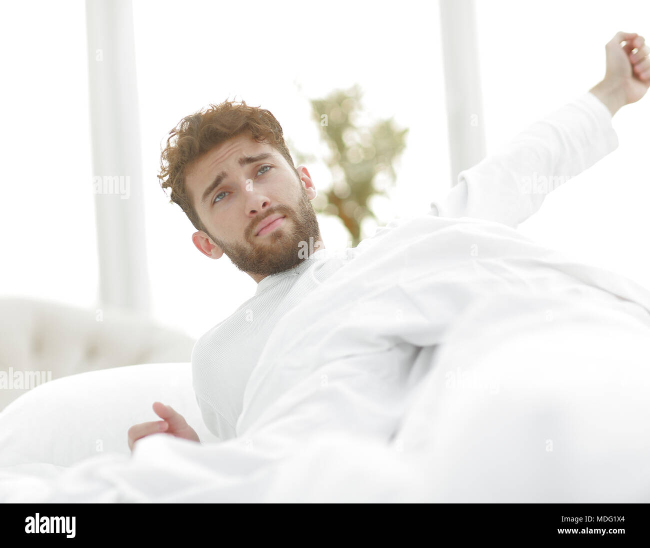 closeup.tired man sleeping on the bed Stock Photo - Alamy