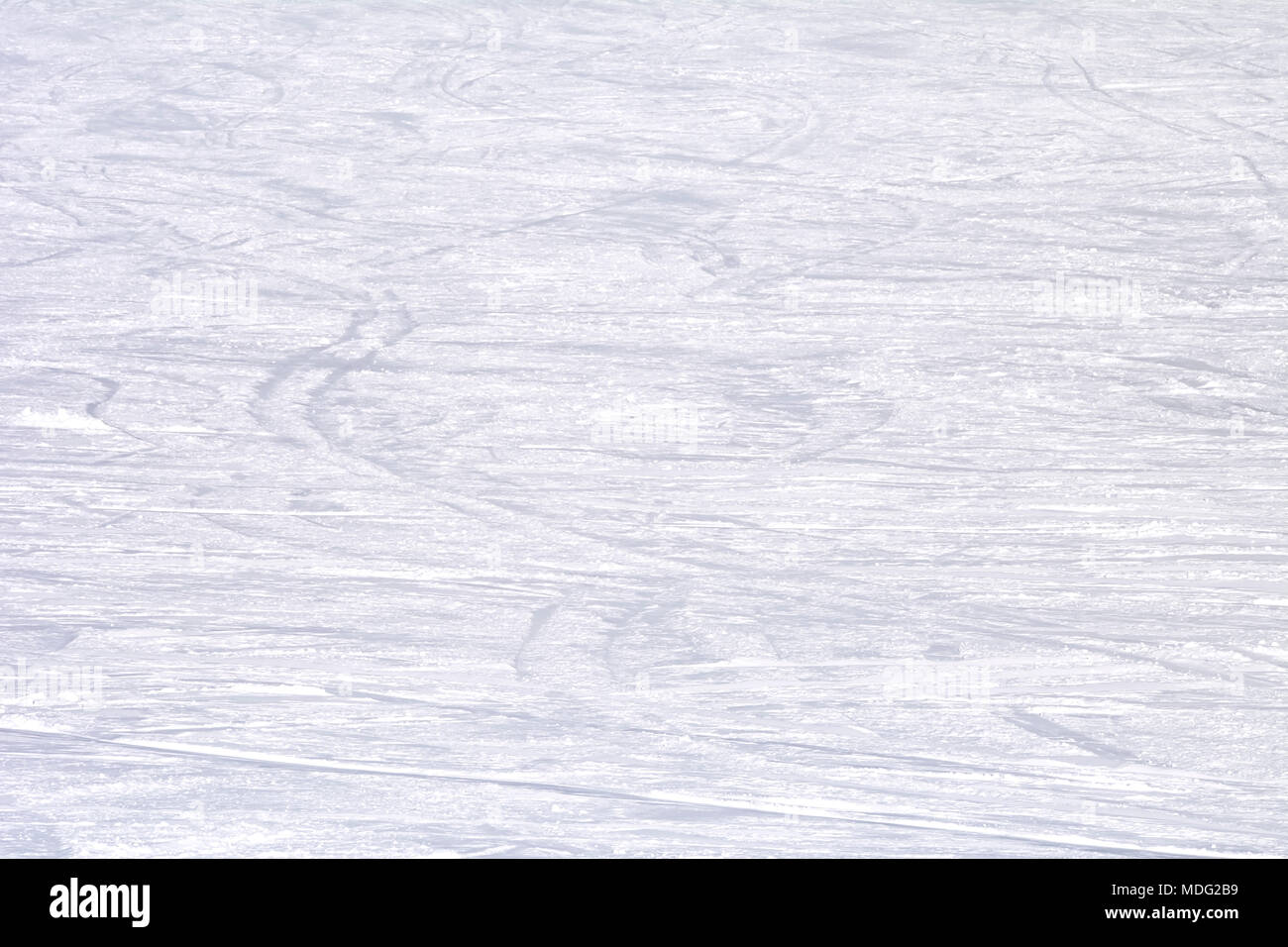 Ski slope with traces of skis on a sunny day. Background, texture Stock ...