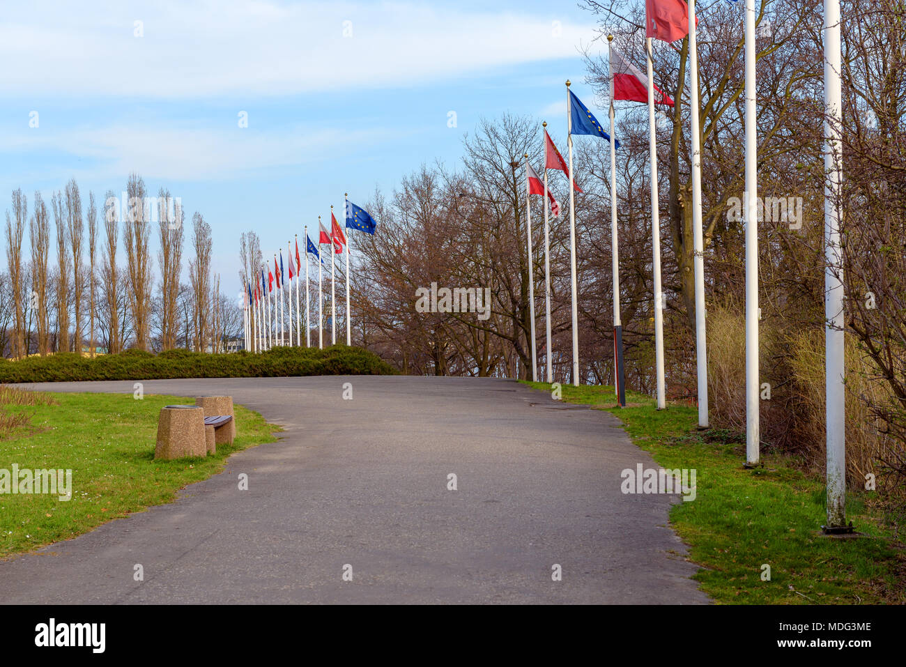 GDANSK WESTERPLATTE, POLAND - April 15, 2017: Masts with flags along ...