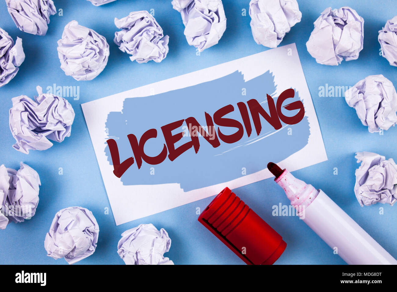 Handwriting text Licensing. Concept meaning Grant a license Legally ...