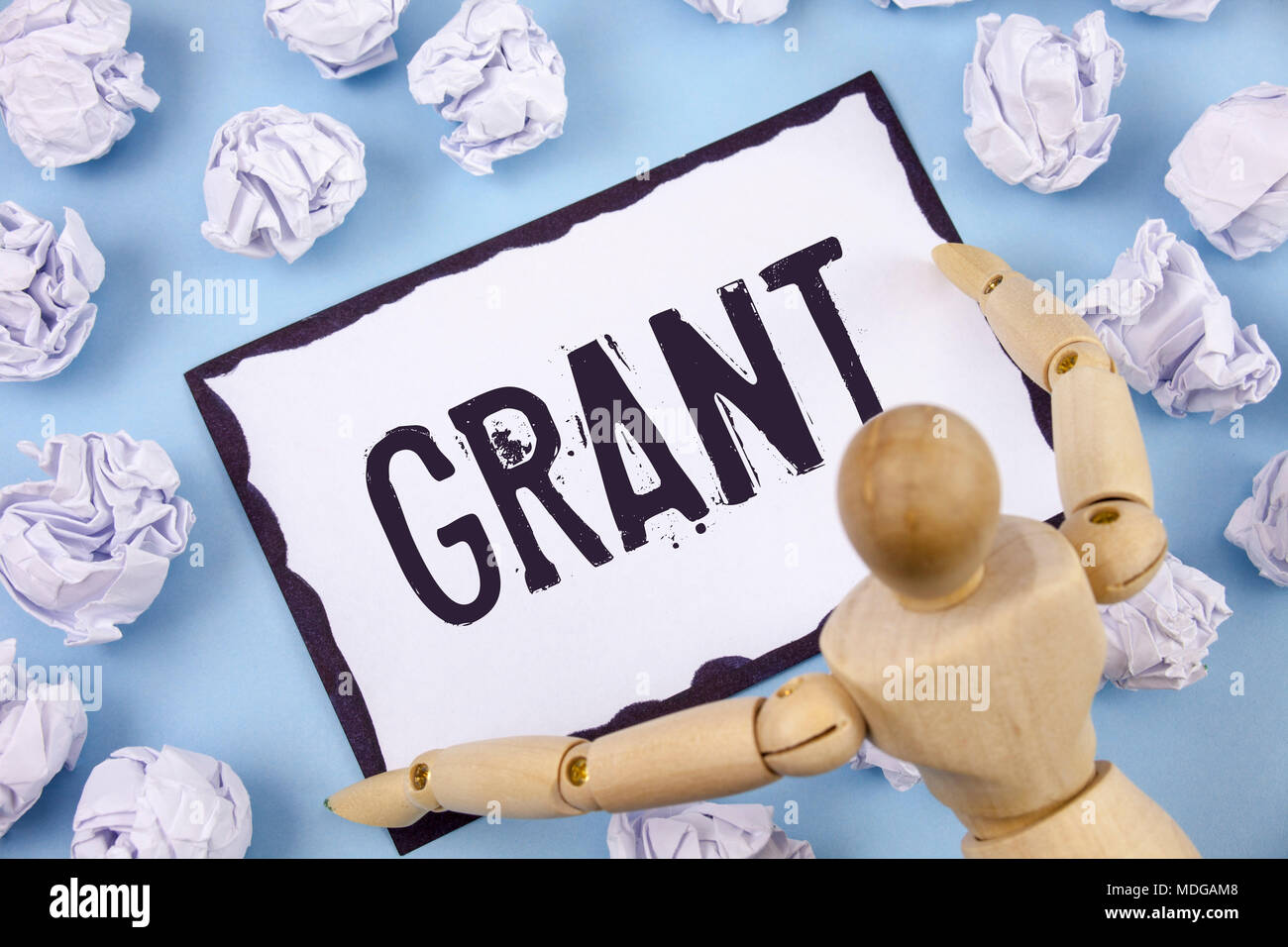 Handwriting text writing Grant. Concept meaning Money given by an ...