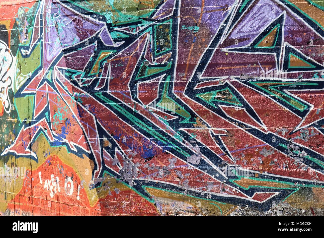 Purple, Green and Red Slashes of Colour on a Concrete Bunker on the ...