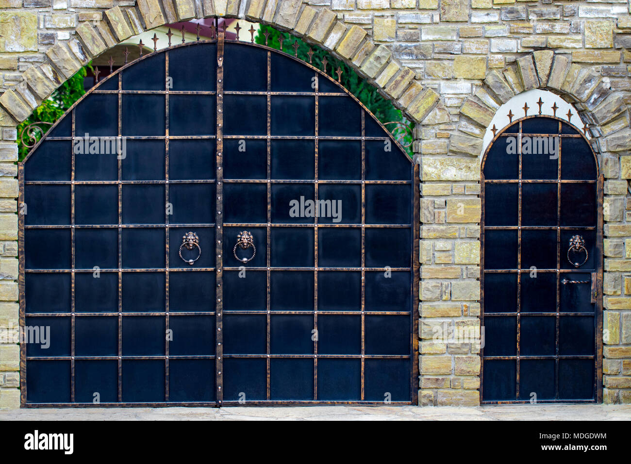 wrought-iron gates, ornamental forging, forged elements close-up Stock ...