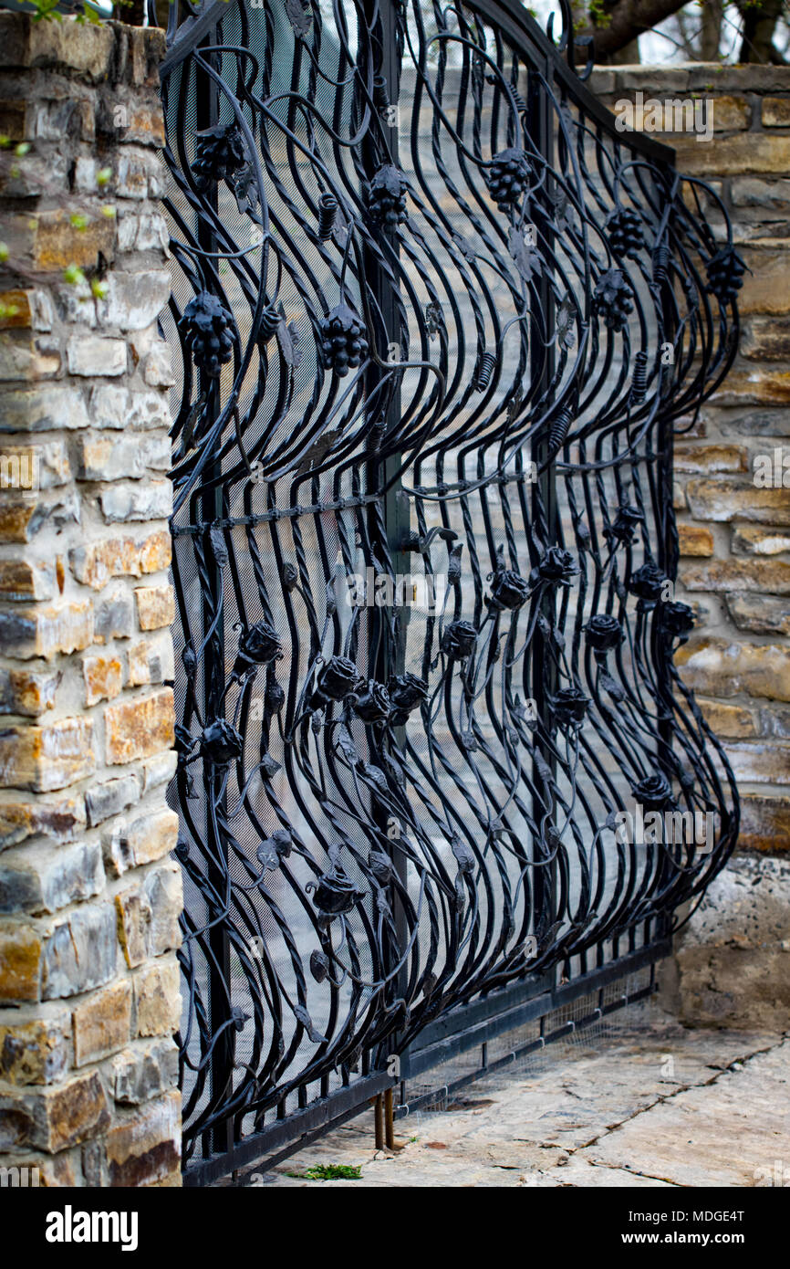 wrought-iron gates, ornamental forging, forged elements close-up Stock ...