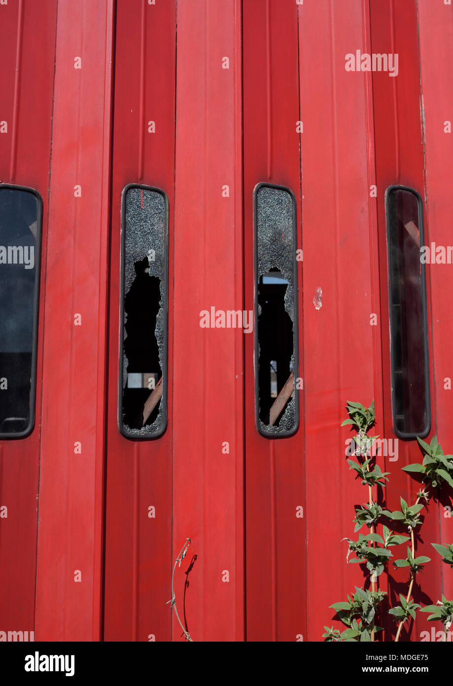 Red concertina shutters hi-res stock photography and images - Alamy