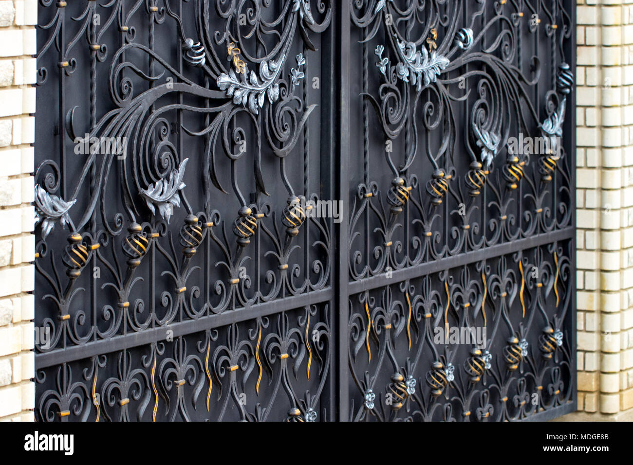 wrought-iron gates, ornamental forging, forged elements close-up Stock ...