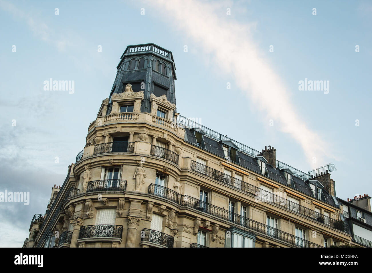 An apartment complex at a junction of a neighborhood in Paris Stock ...