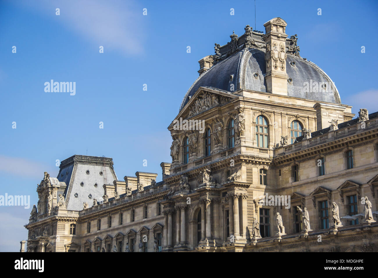 Main building of Louvre Museum (Musée du Louvre) in a clear day Stock ...