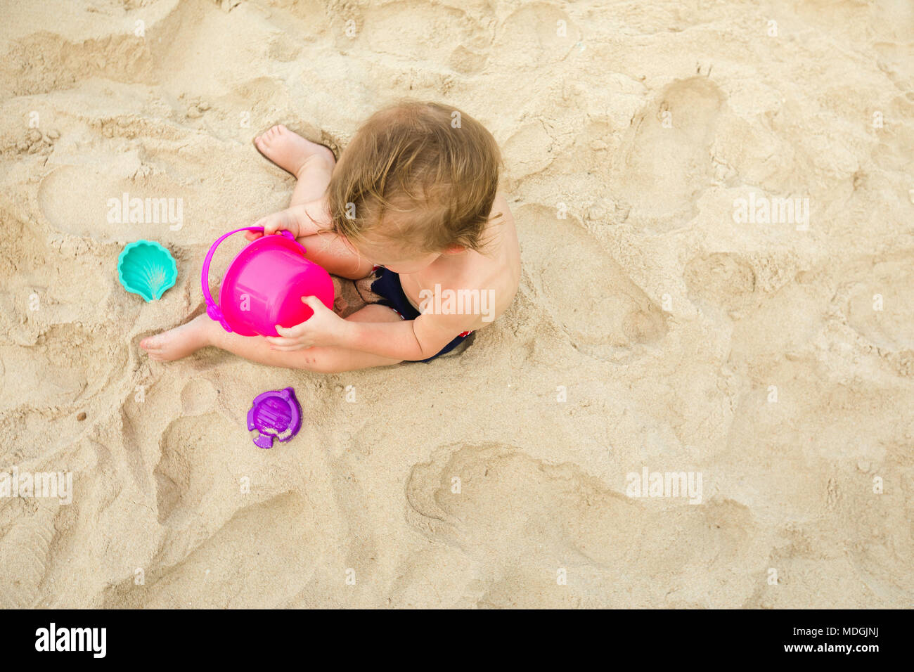Playing beach sand hi-res stock photography and images - Alamy
