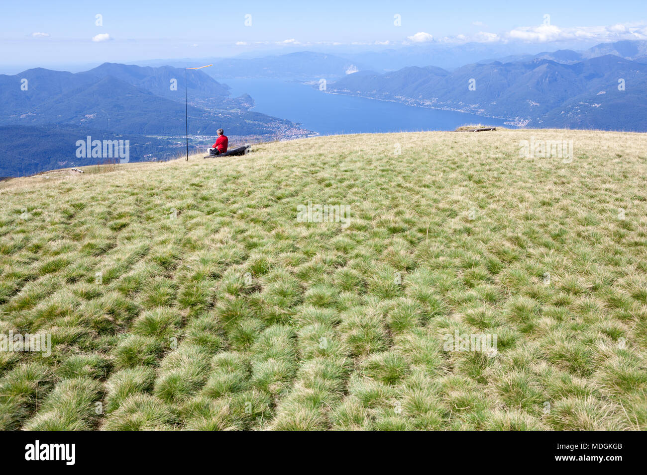 A tourist contemplating the beautiful view of Lago Maggiore (Lake ...