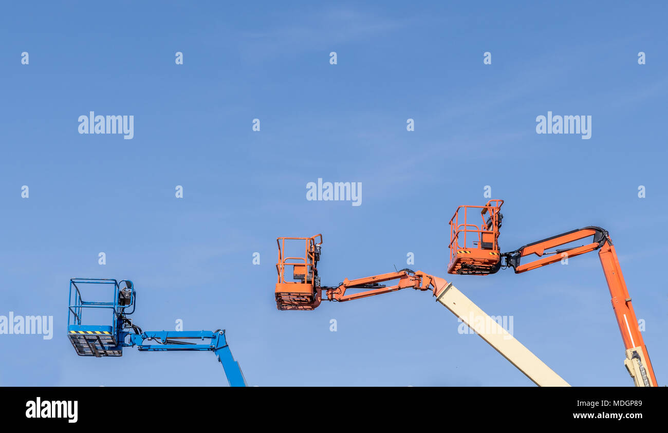 Blue cherry picker hi-res stock photography and images - Alamy