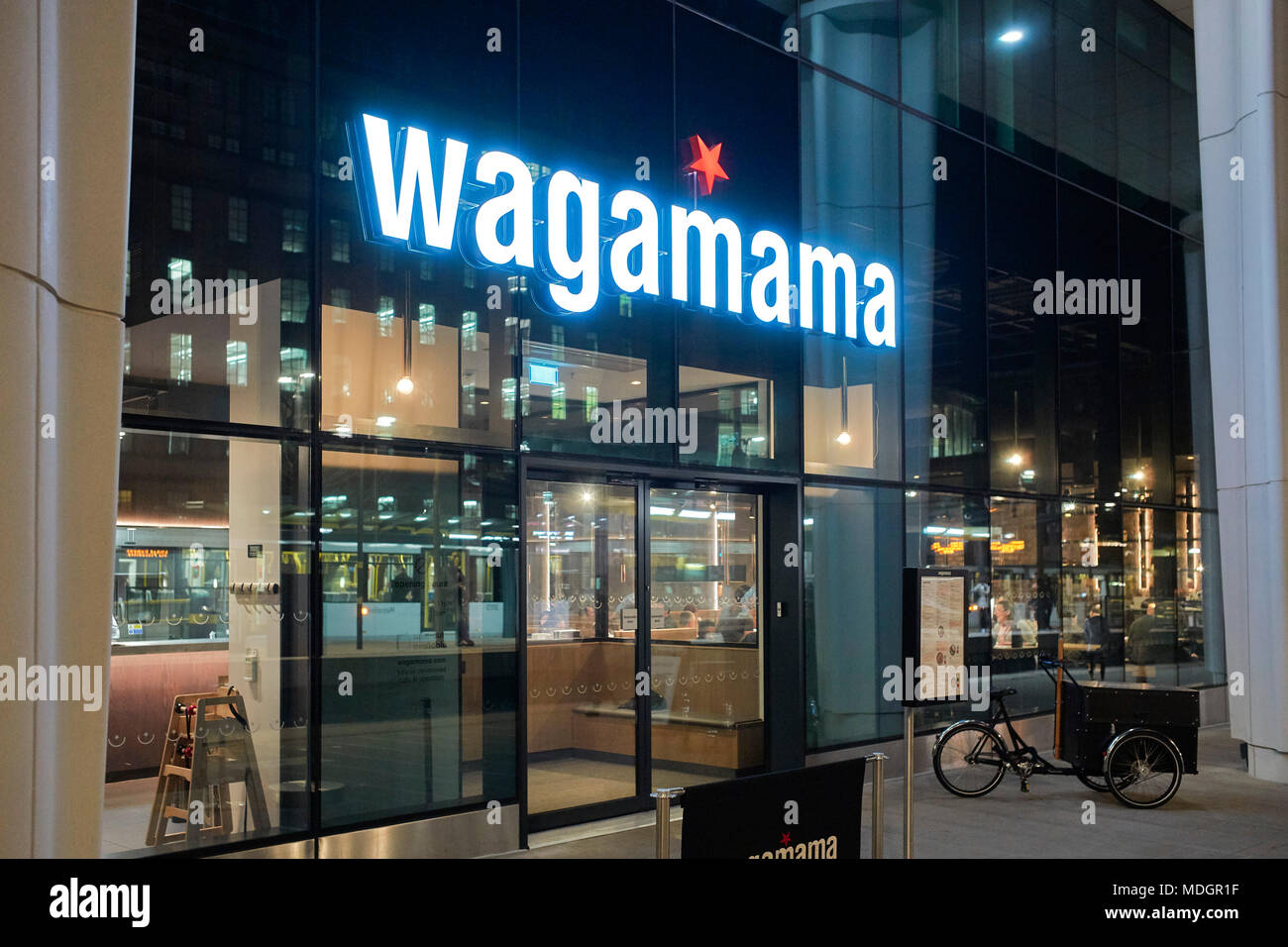 Wagamama restaurant at night in St Peter’s Square, Manchester Stock ...