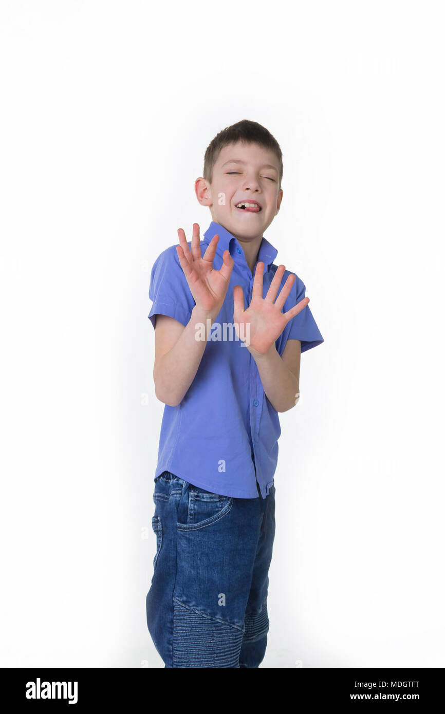 Portrait of a young boy making stop gesture on white background Stock ...