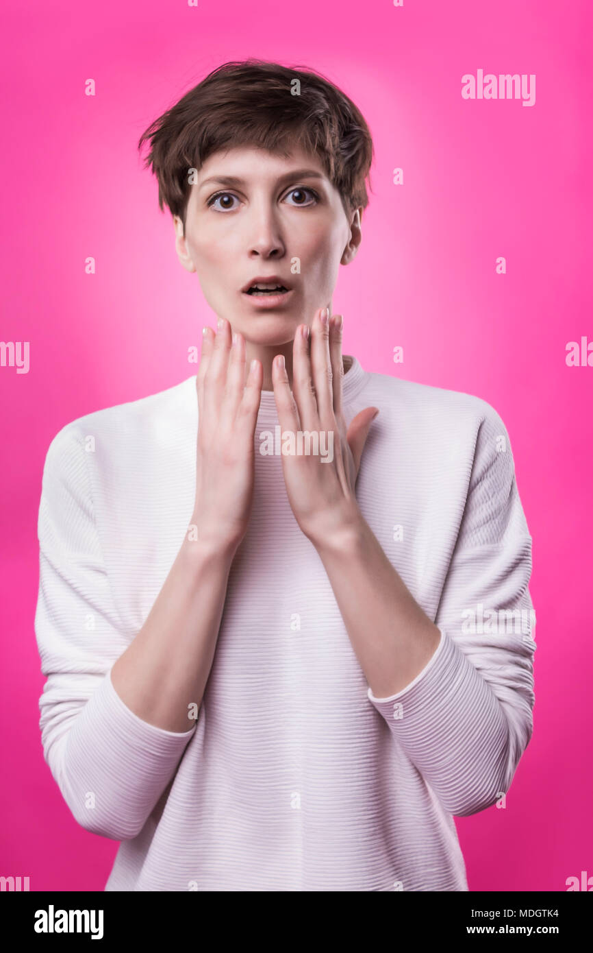 Wow. Beautiful female half-length front portrait isolated on pink ...