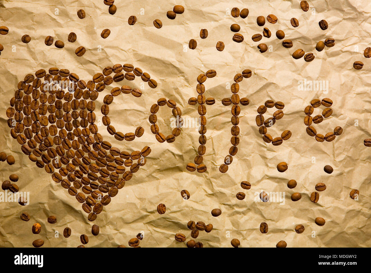 The symbol of the heart and the inscription "coffee" in English. Mosaic ...