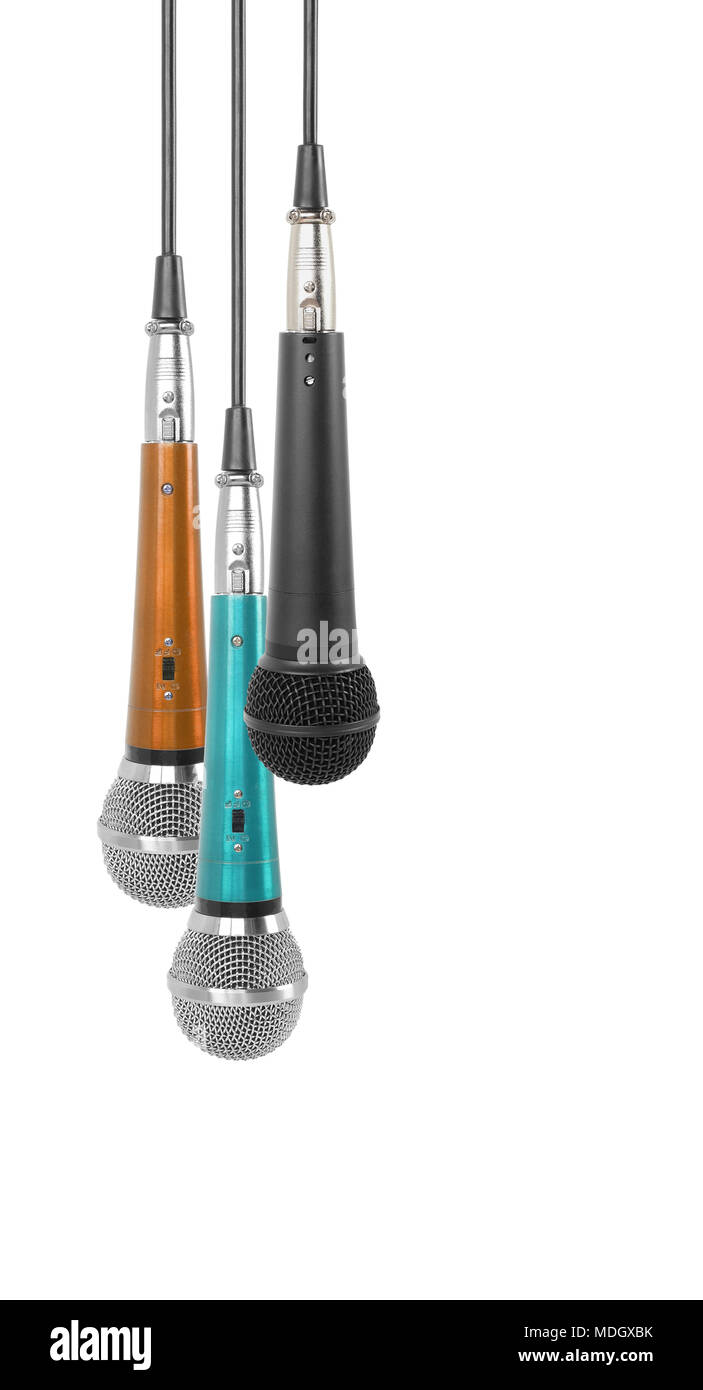 Music and sound - Three vocal microphone hang down isolated on a white ...