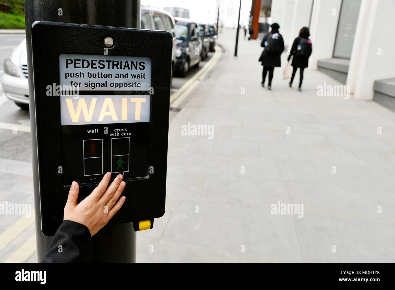 Pedestrians Traffic Light push button - London - England Stock Photo ...