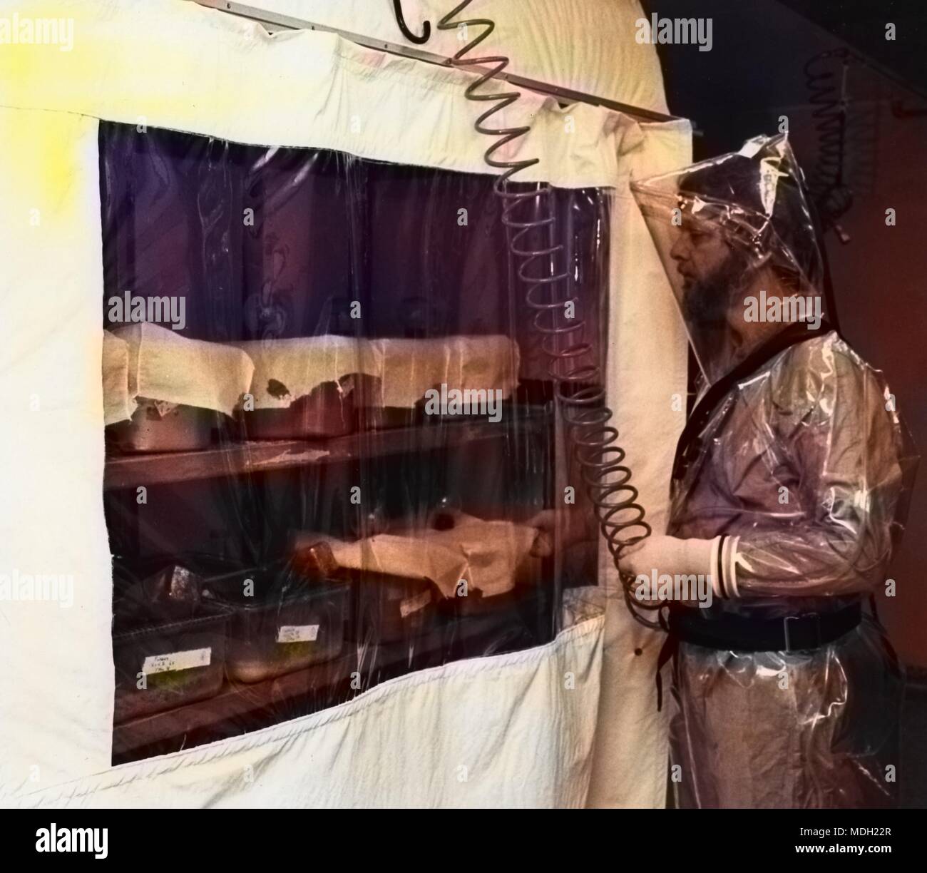 Centers for Disease Control (CDC) laboratorian in a containment suit ...