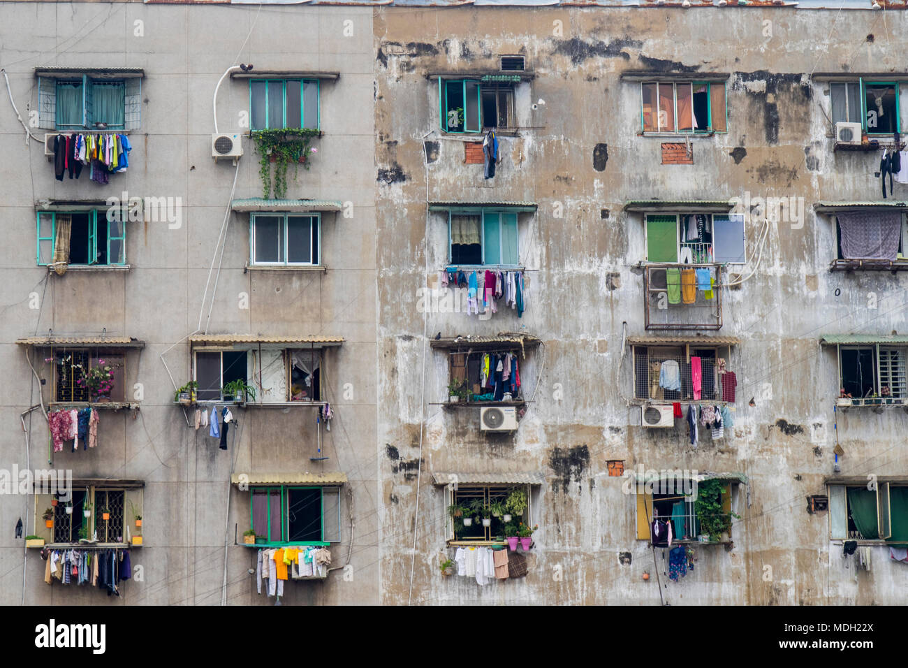 The facade of a residential building and clothes drying on clothes ...