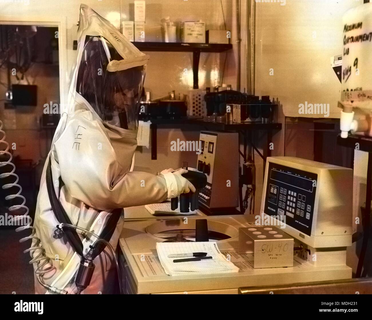 Centers for Disease Control (CDC) laboratorian in a containment suit ...