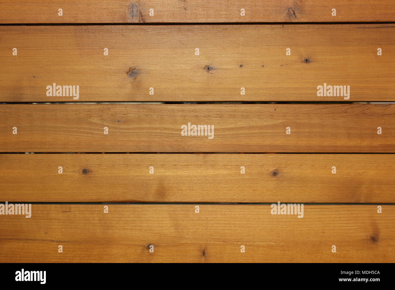 Elevation of beautiful golden wood fence Stock Photo - Alamy