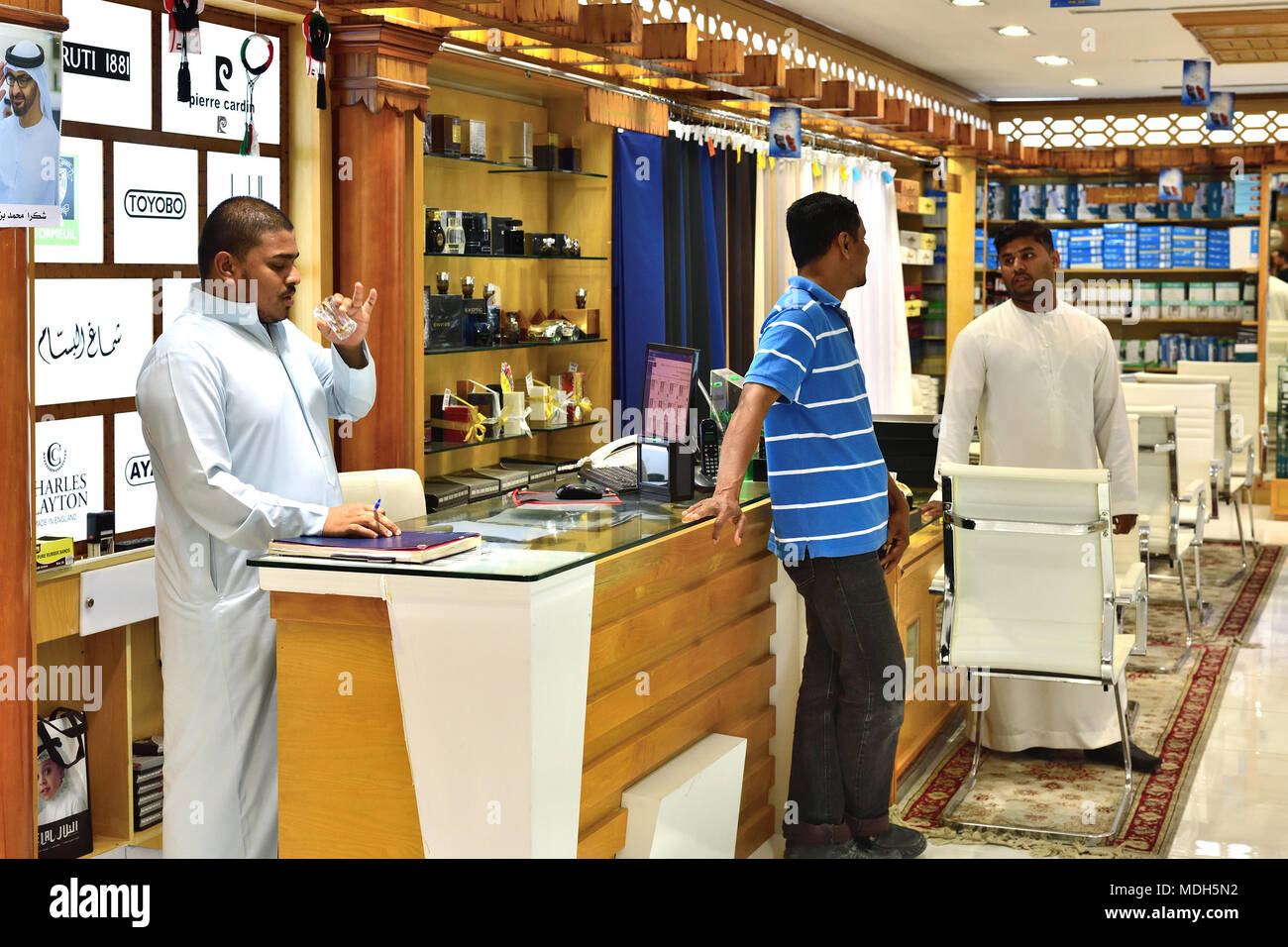 Ajman, UAE - April 9. 2018. Shop of mens traditional Arabic clothing ...
