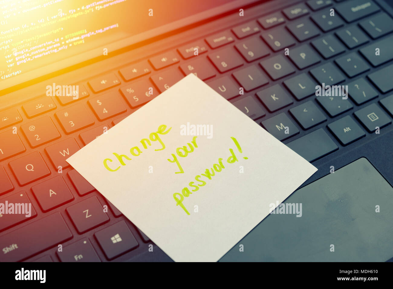 Change your password message concept written post it on laptop keyboard ...