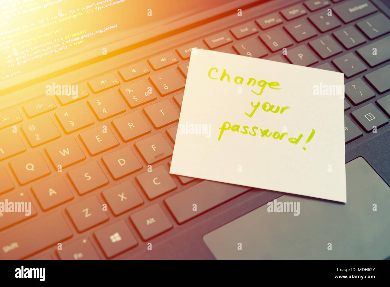 Change your password message concept written post it on laptop keyboard ...
