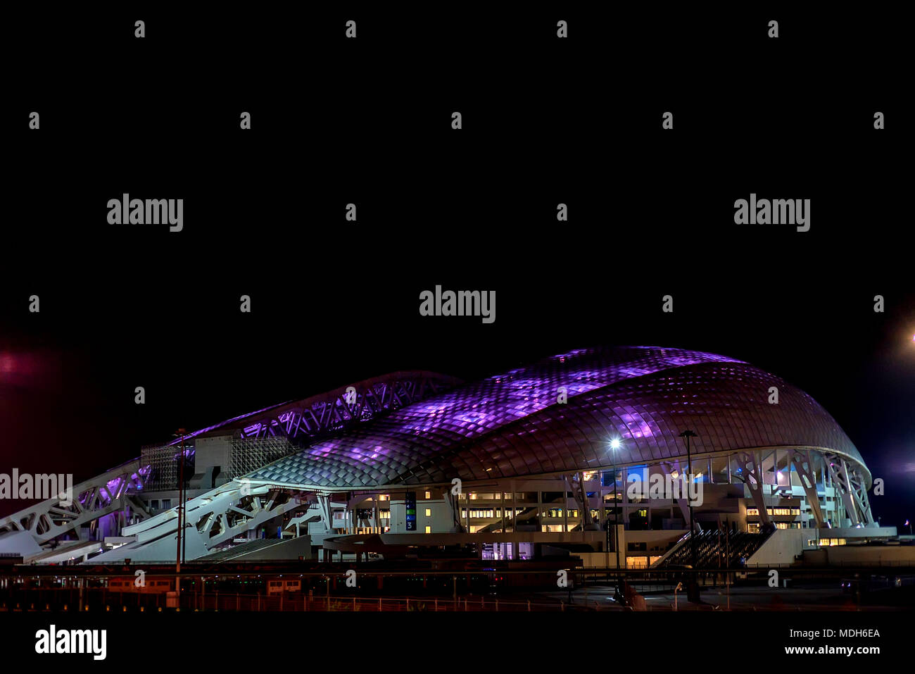 Evening view of Fisht Olympic Stadium in Sochi Stock Photo - Alamy