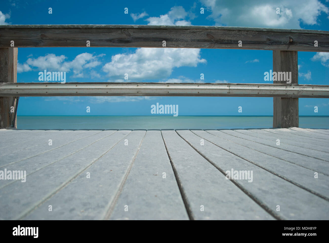 Ocean shore. Ocean view landmark. Beach home. Waves and sandy shore ...