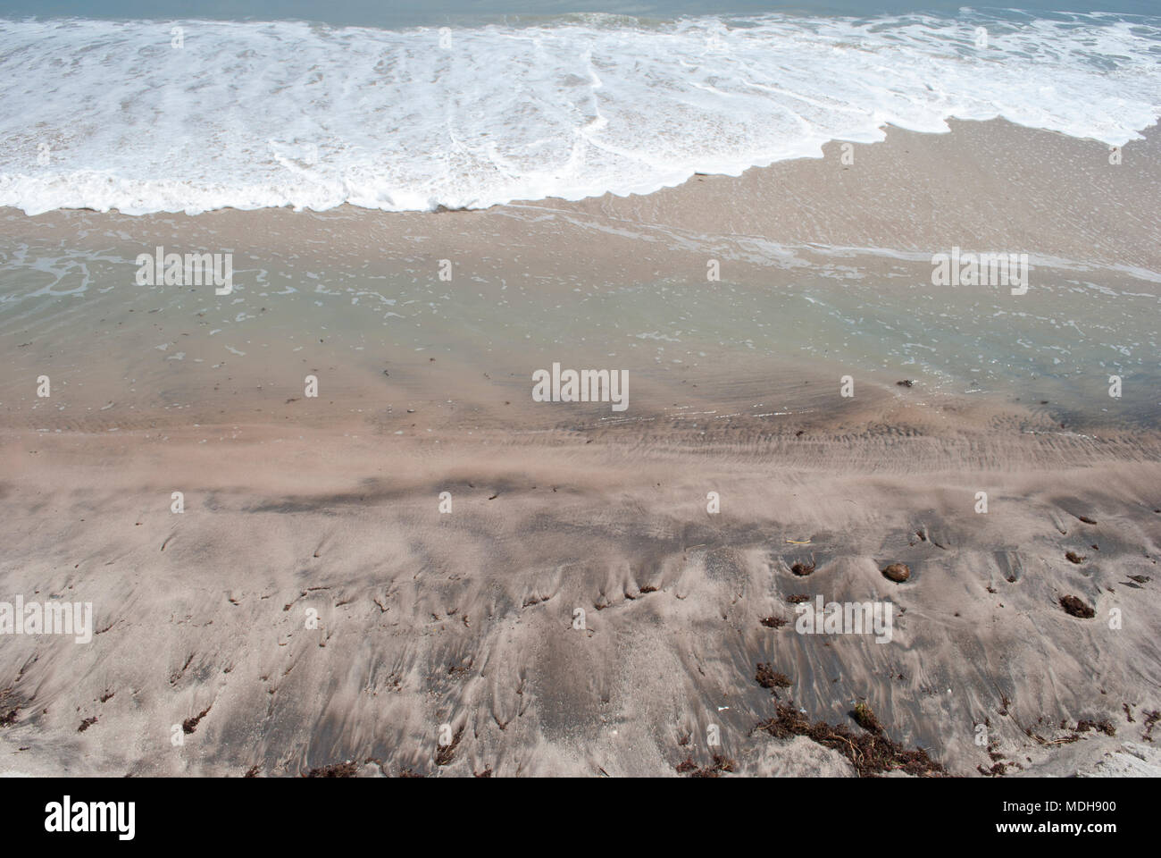 Ocean shore. Ocean view landmark. Beach home. Waves and sandy shore ...